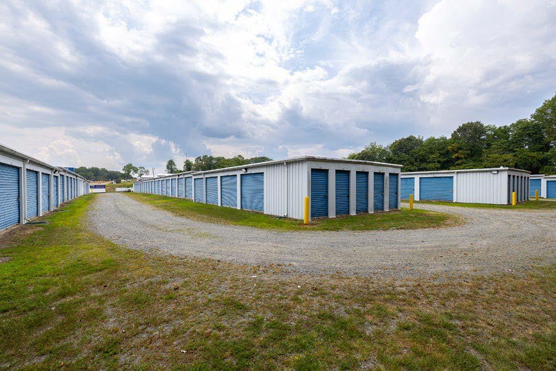 Fenced & Lighted Facility with Drive-Up Units and Tractor Trailer ...