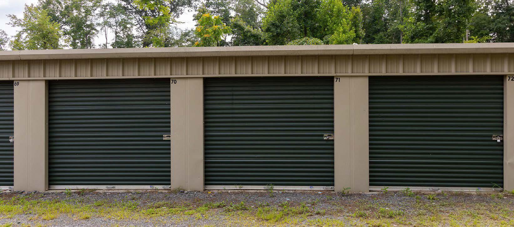 Fenced & Lighted Facility with Drive-Up Units and Tractor Trailer ...